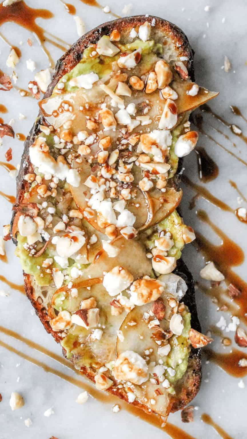 Balsamic Pear Avocado Toast with Feta & Hazelnuts - bon abbetit