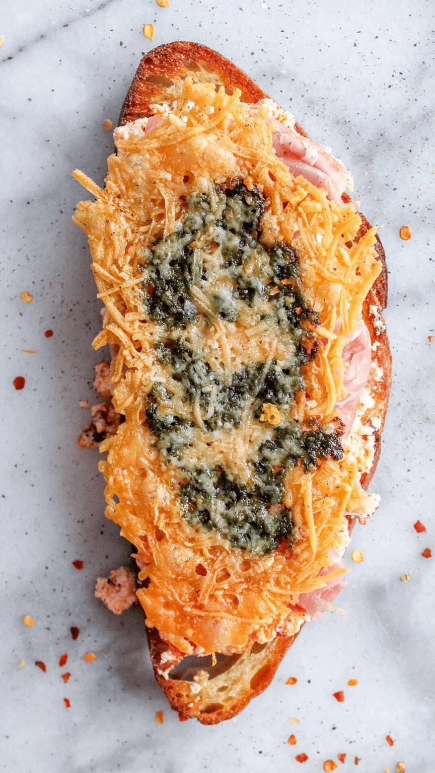 Chili Ricotta Toast with a Pesto Parmesan Crisp & Prosciutto - bon abbetit