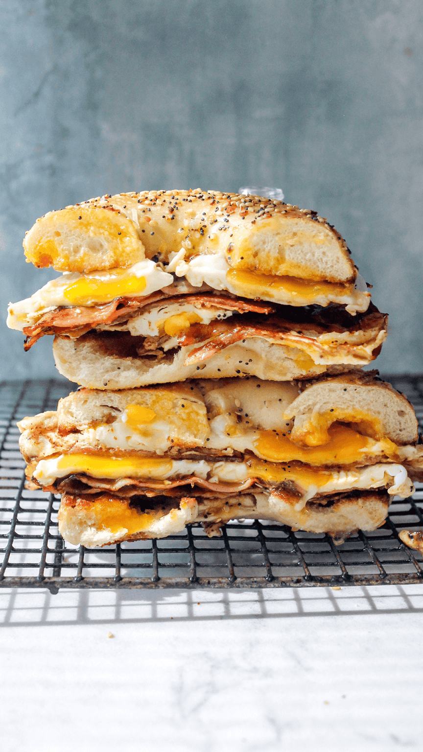 Eggs, Ham, Cheddar Bagel Sandwich with Maple Syrup - bon abbetit